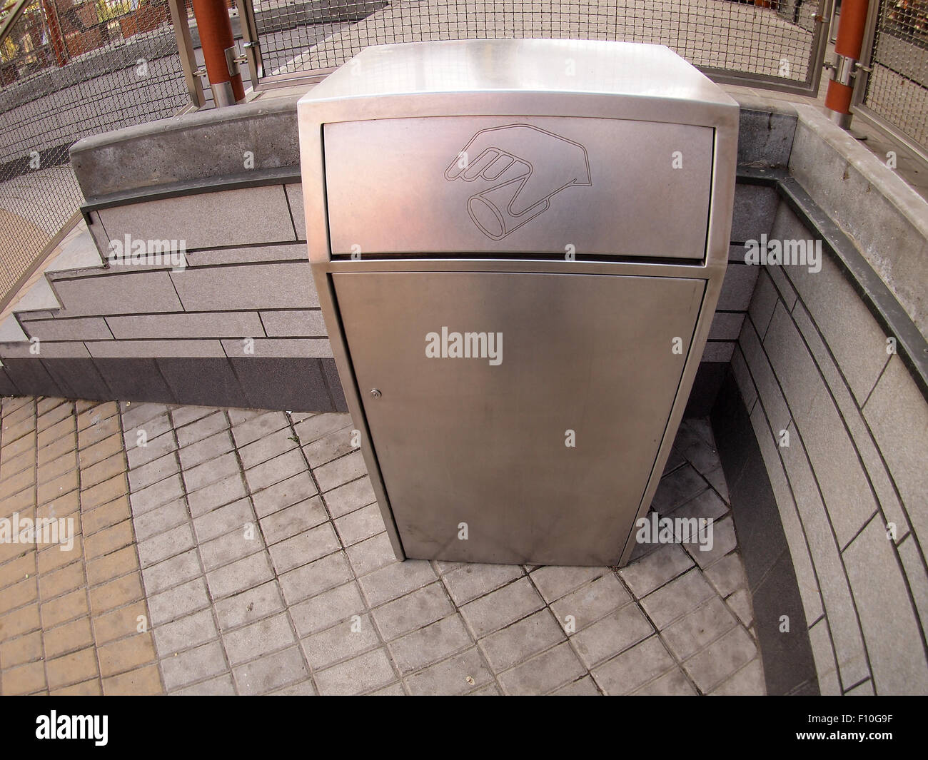 Metal container for trash on the street with wide angle distortion view ...