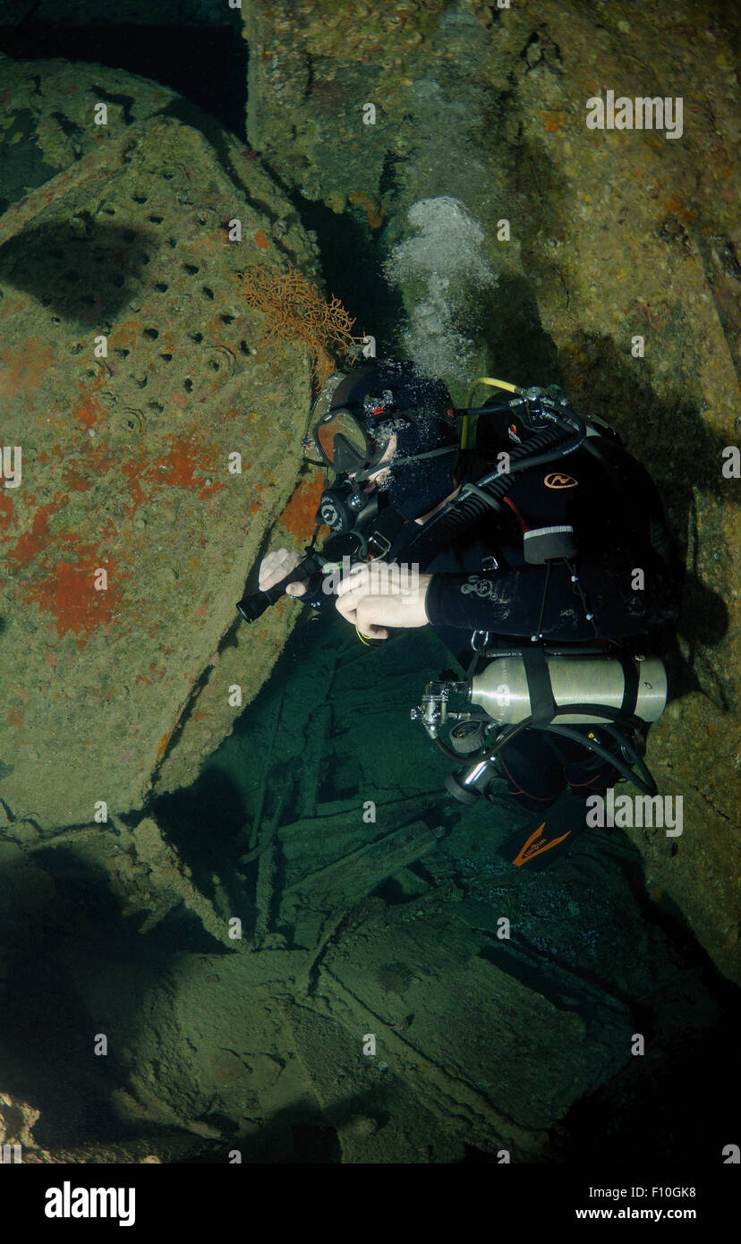 Red Sea, Egypt. 15th Oct, 2014. Diver looking at shipwreck ''SS ...