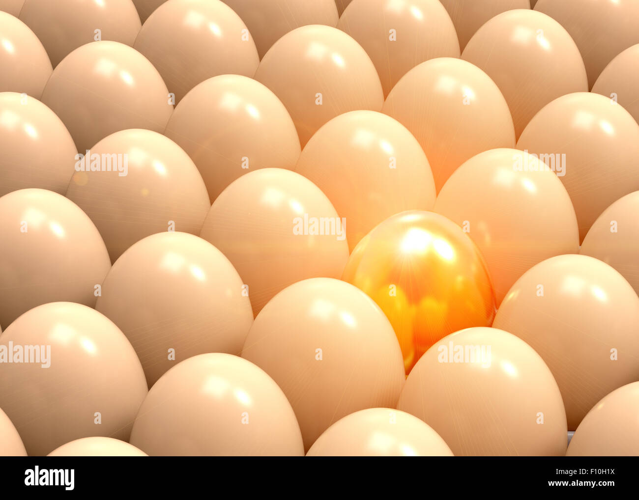 Golden egg among common eggs Stock Photo - Alamy