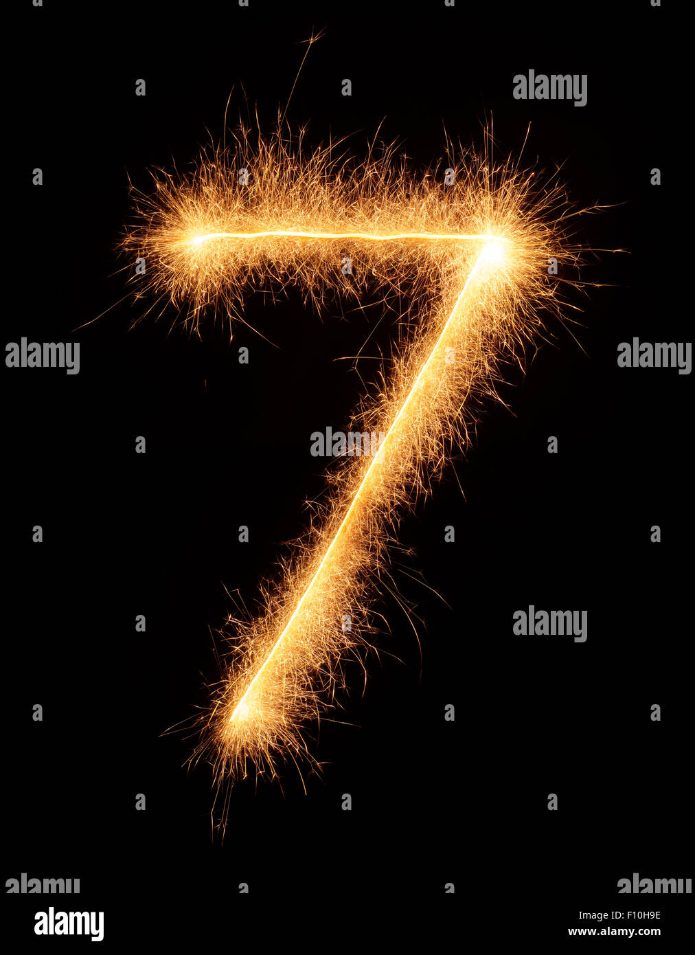 "7" number drawn with bengali sparkles isolated on black background ...