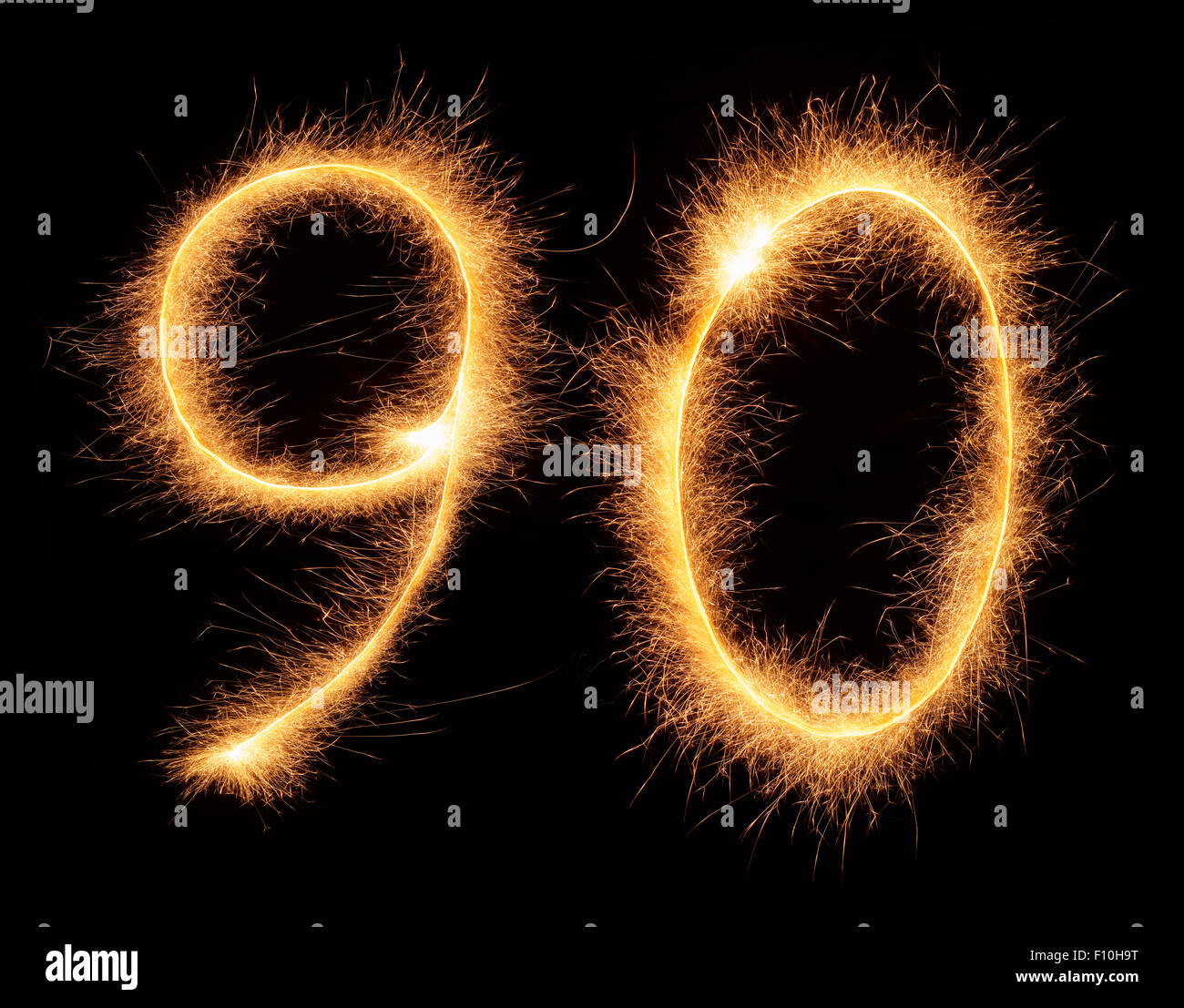 "90" number drawn with bengali sparkles isolated on black background ...