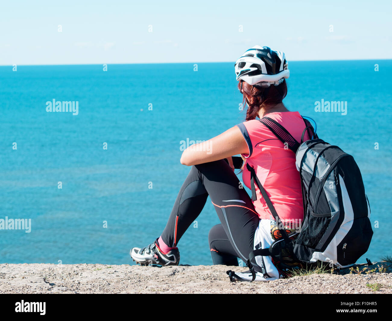 Biker standing at back wheel hi-res stock photography and images - Alamy
