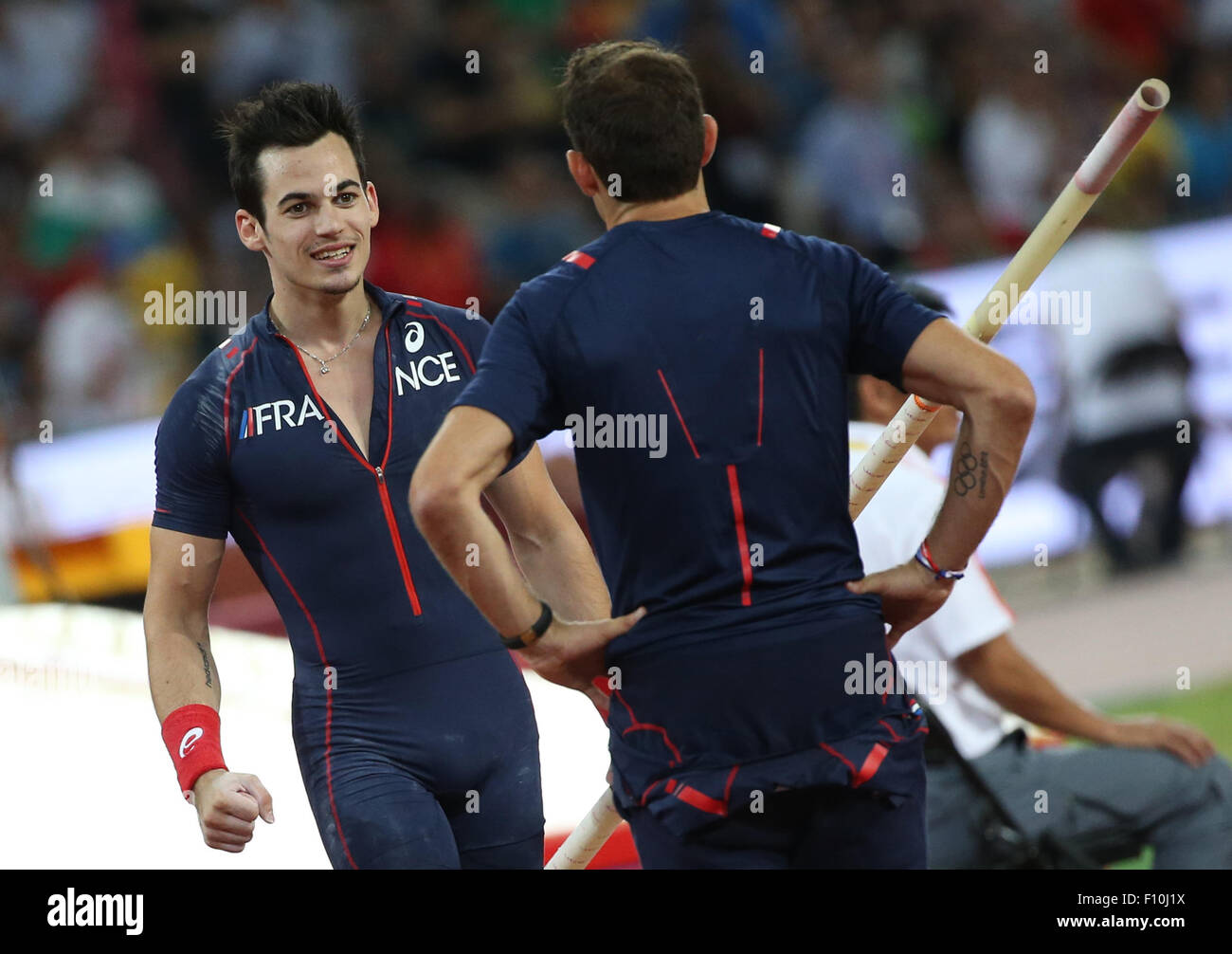 Beijing, China. 24th Aug, 2015. Renaud Lavillenie (R) of France and ...
