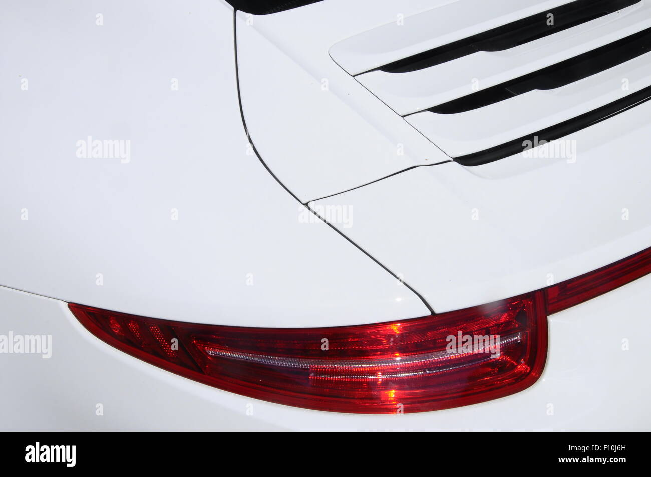 Red and white car hi-res stock photography and images - Alamy