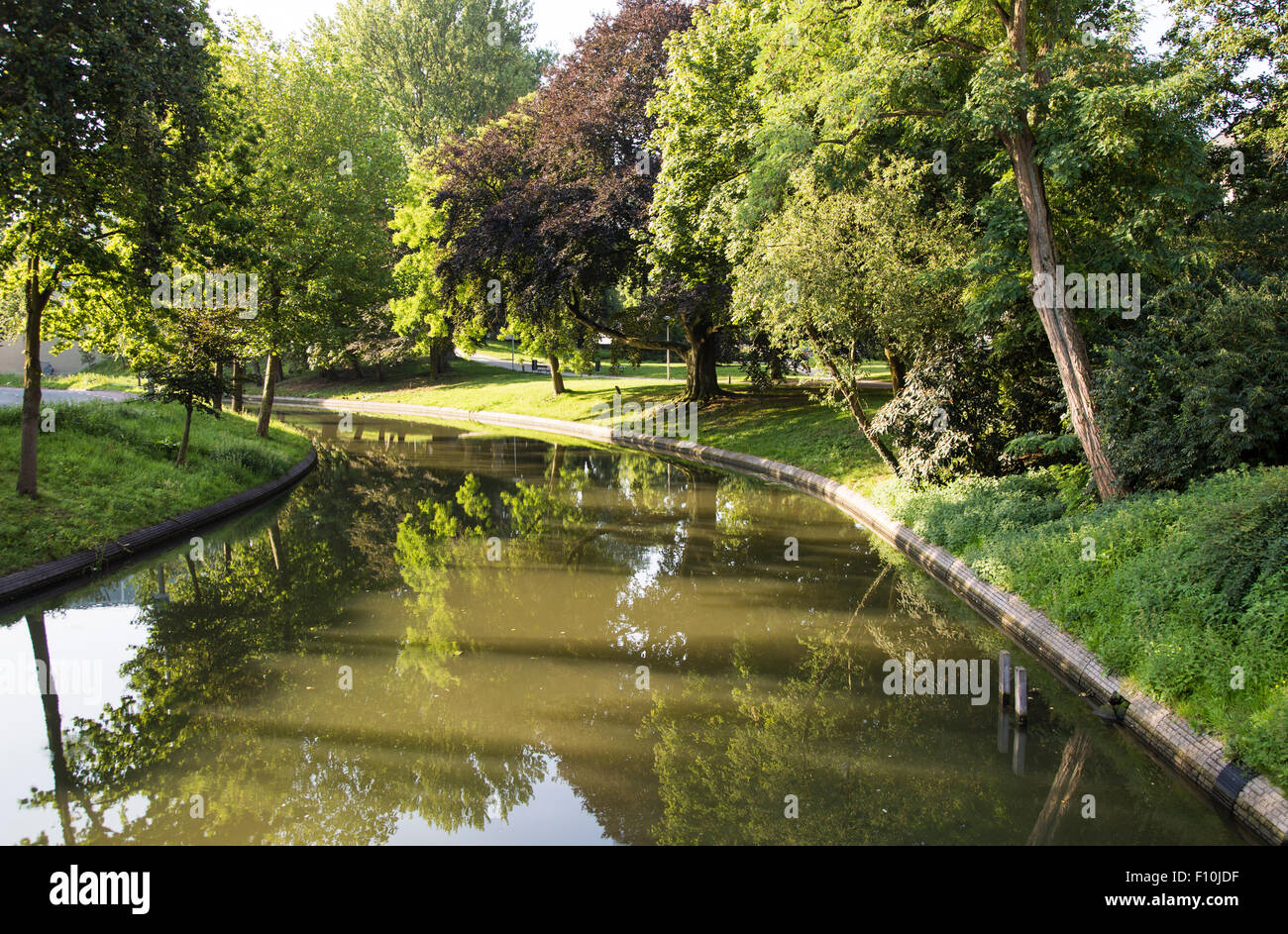 Tree lined waterway in park in central, Utrecht, Netherlands Stock ...