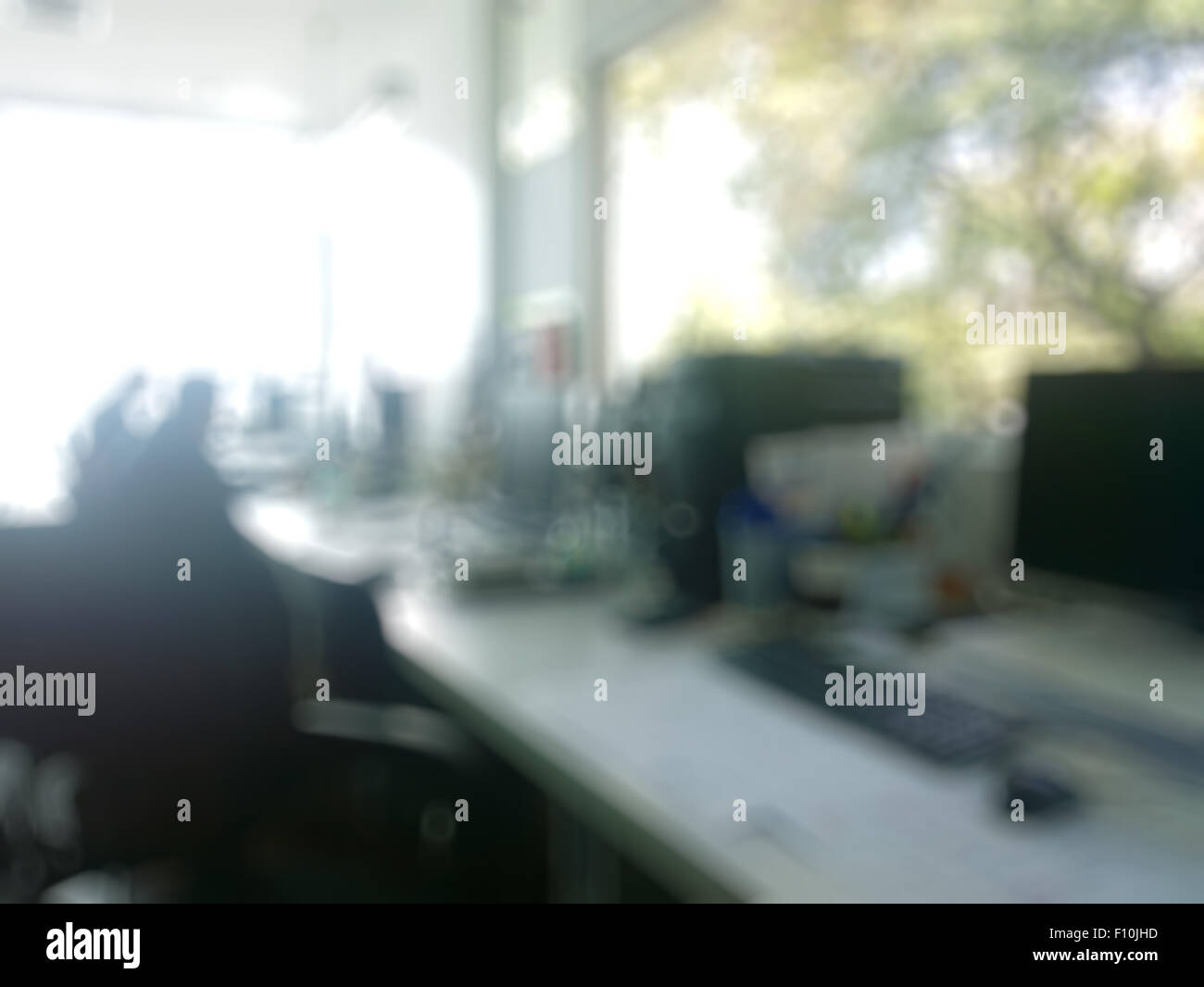 abstract office with computer blur background Stock Photo - Alamy
