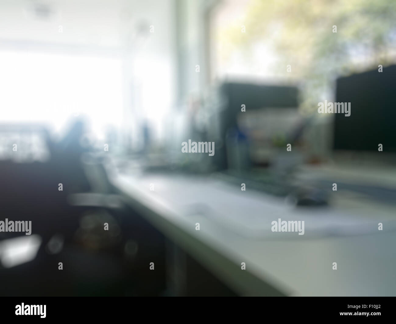 abstract office with computer blur background Stock Photo - Alamy