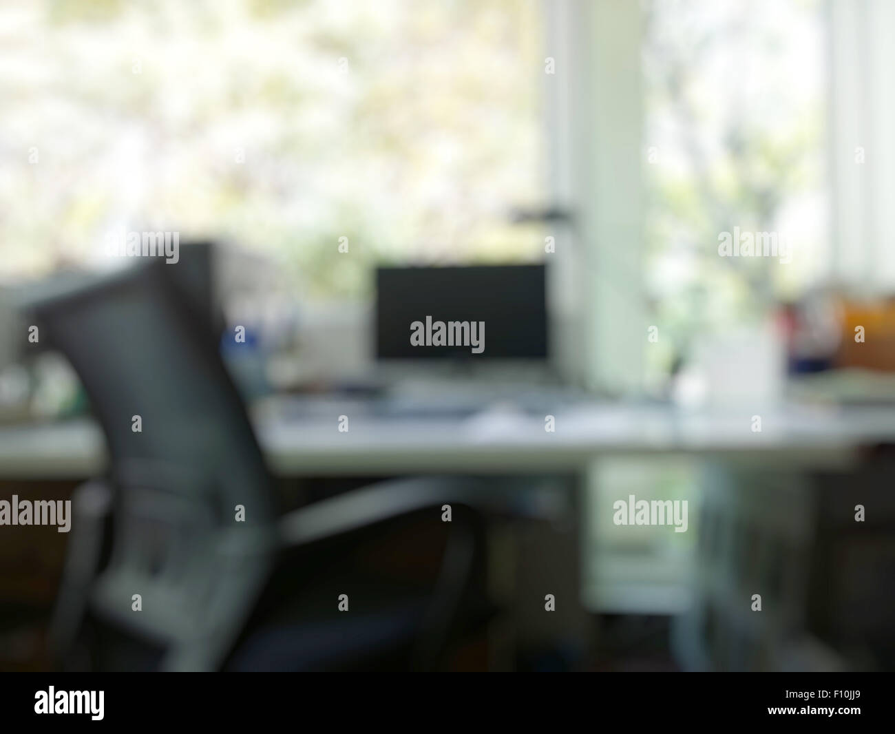 abstract office with computer blur background Stock Photo - Alamy