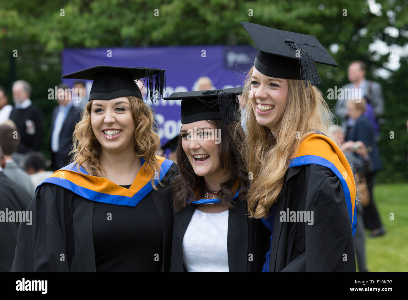 group of graduating university students after the ceremony in cap and ...