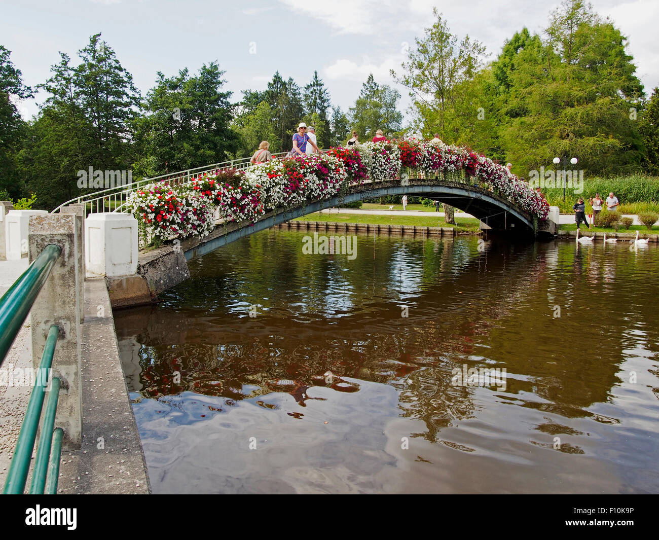 The floral bridge in the Casino Gardens in Bagnoles-de-l'Orne, Normandy ...
