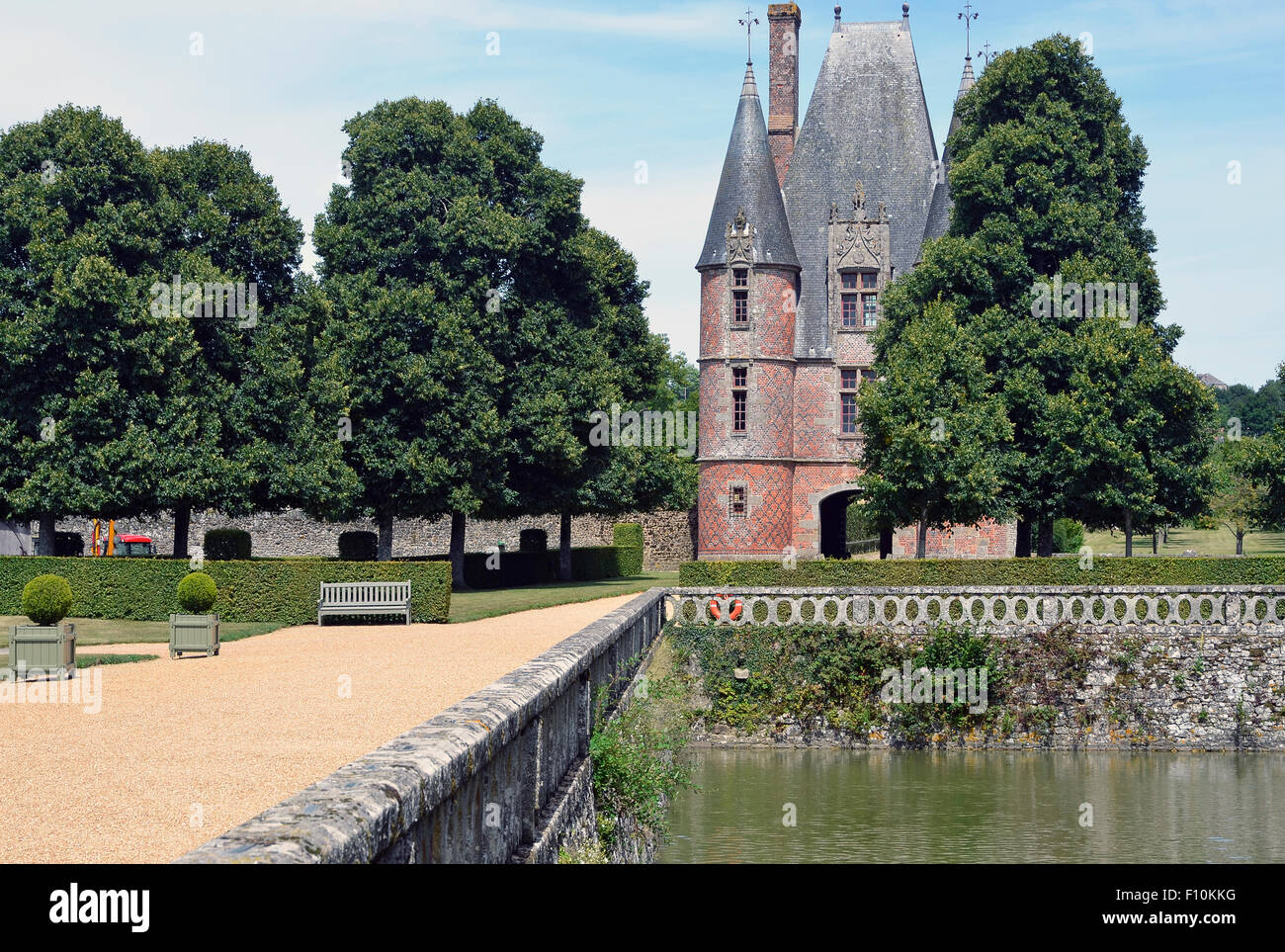 The gatehouse of the Château de Carrouges, an unusual brick built ...
