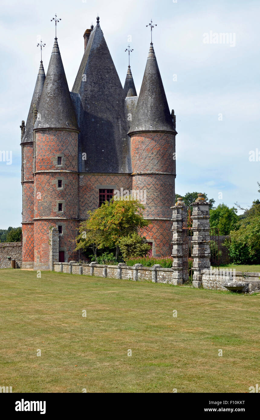 The gatehouse of the Château de Carrouges, an unusual brick built ...