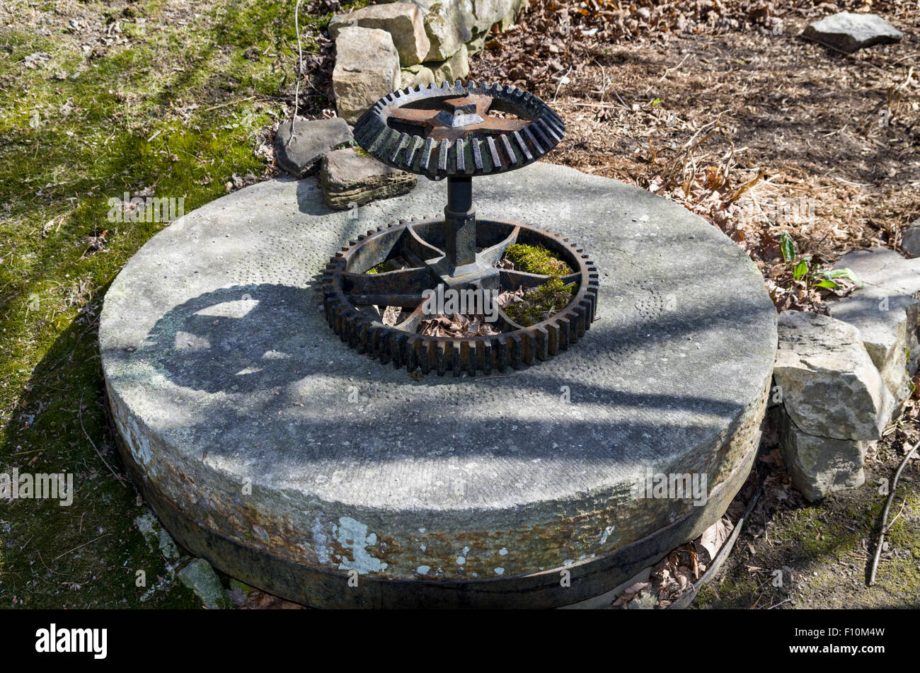 Parts of an old mill stone at Mill of Kintail Almonte Ontario Stock ...