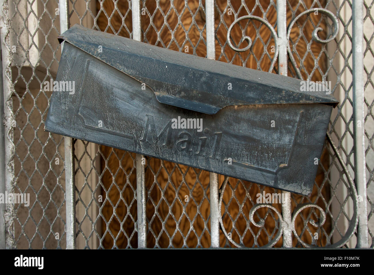 Crooked mailbox attached to a front gate on 24th Street in Noe Valley ...