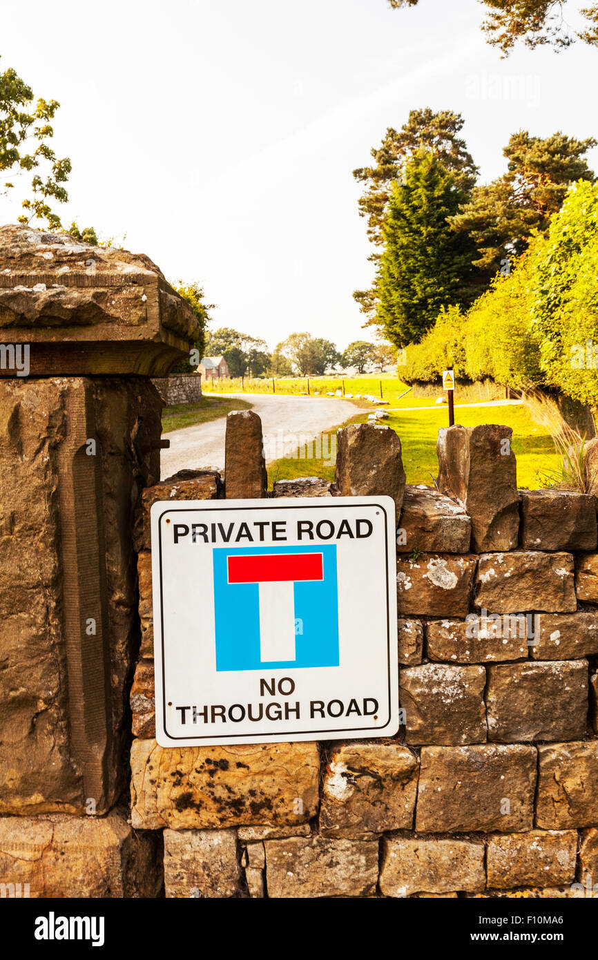 Private road no through road sign on wall drive driveway North ...