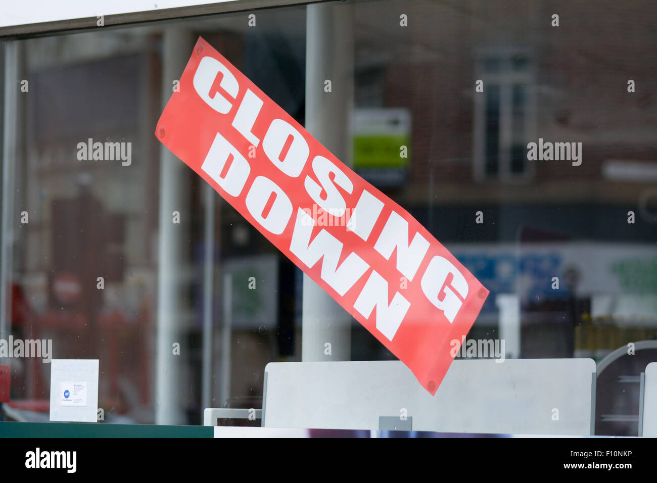 Closing Down sign in window of shop on the High Street in Bedford ...