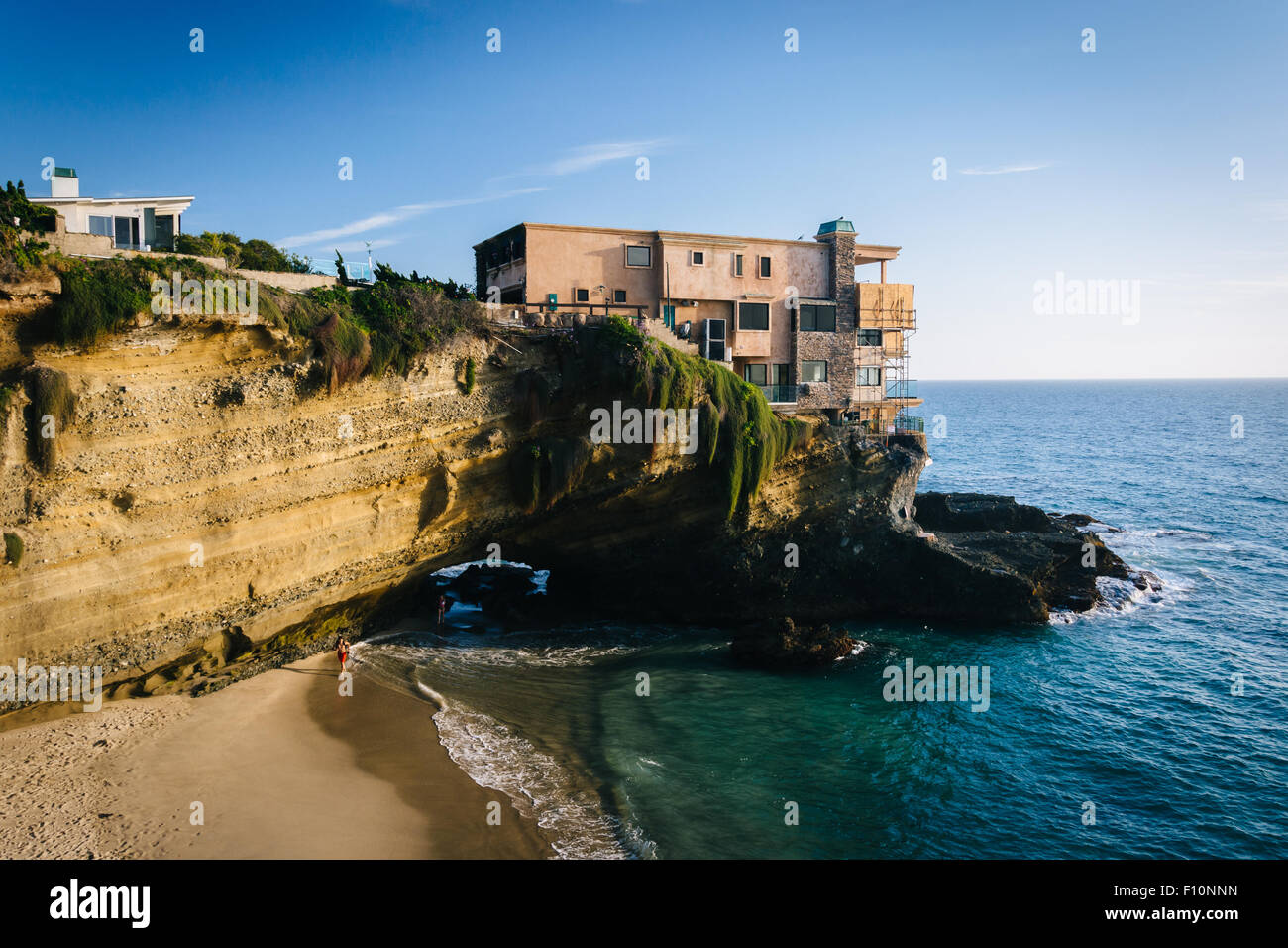 View of a house on a cliff and a small cove at Table Rock Beach, in ...