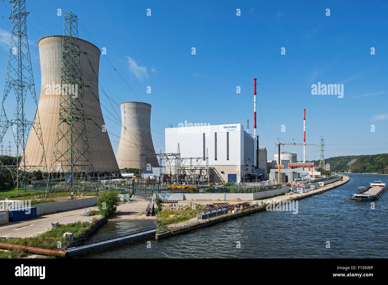 Canal barge and cooling towers of the Tihange Nuclear Power Station ...