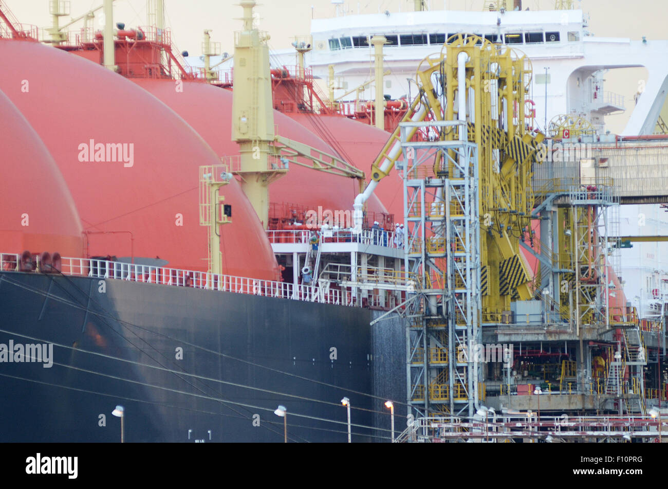 Loading arm, transporting from station to LNG Tanker Stock Photo - Alamy