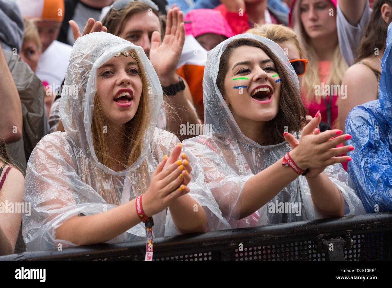 Music fans at the V Festival in Chelmsford Essex in the rain Stock ...