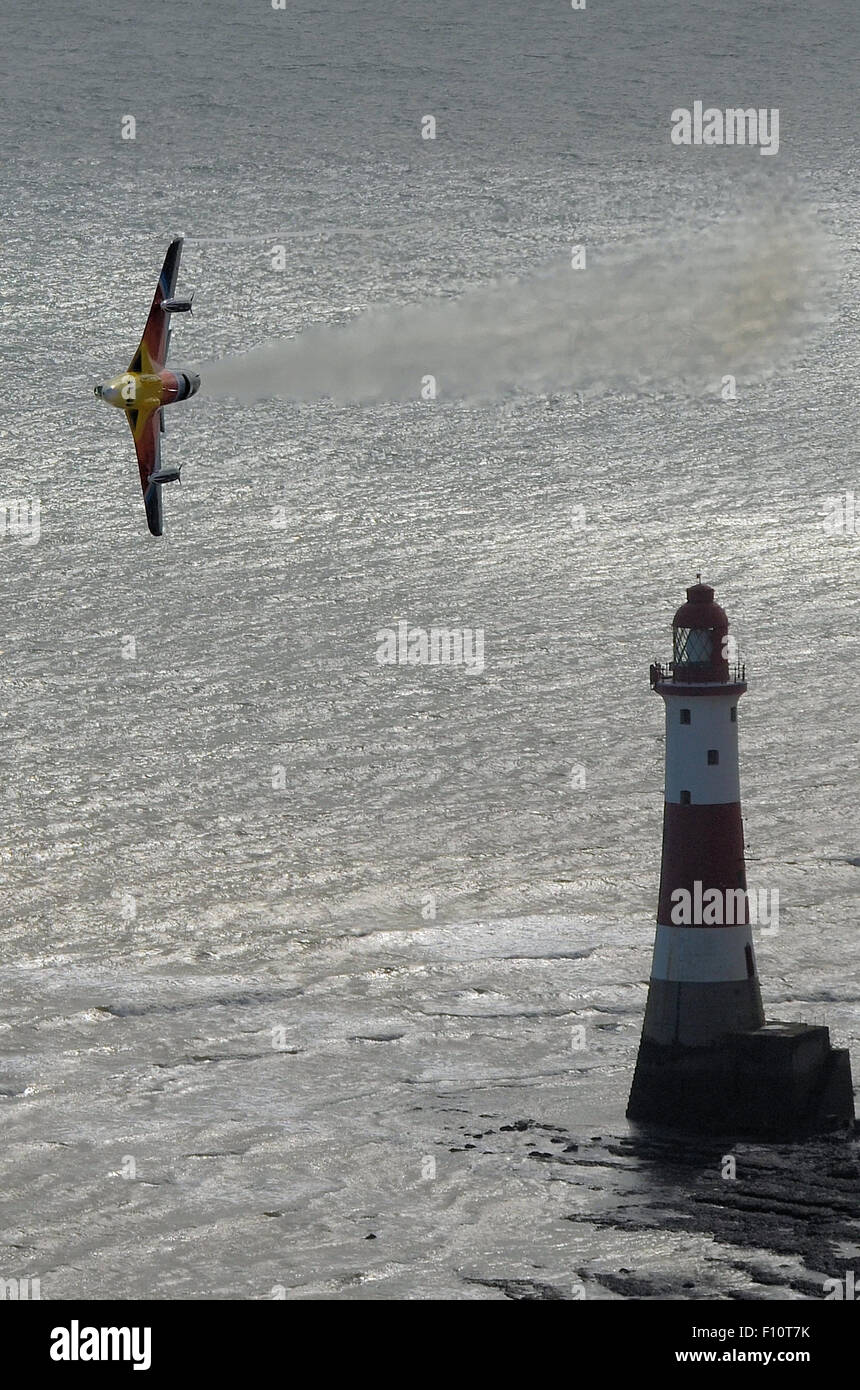 Hawker Hunter flying past Beachy Head Lighthouse. Vintage jet plane ...