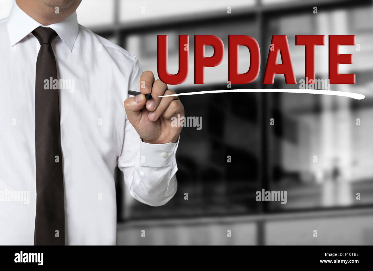 update is written by businessman background concept Stock Photo - Alamy