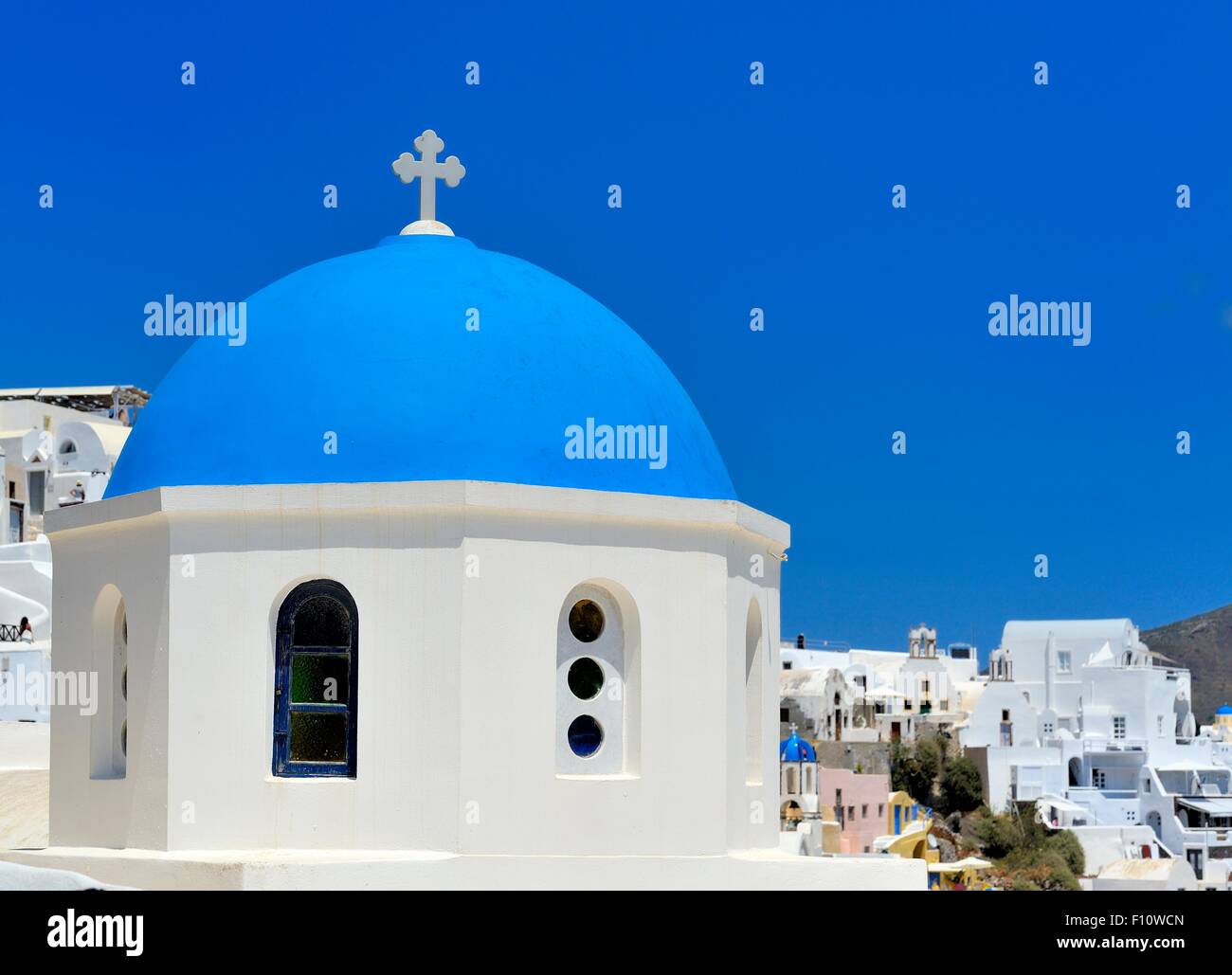 The iconic blue domed Churches on the island of Santorini,Greece Stock ...