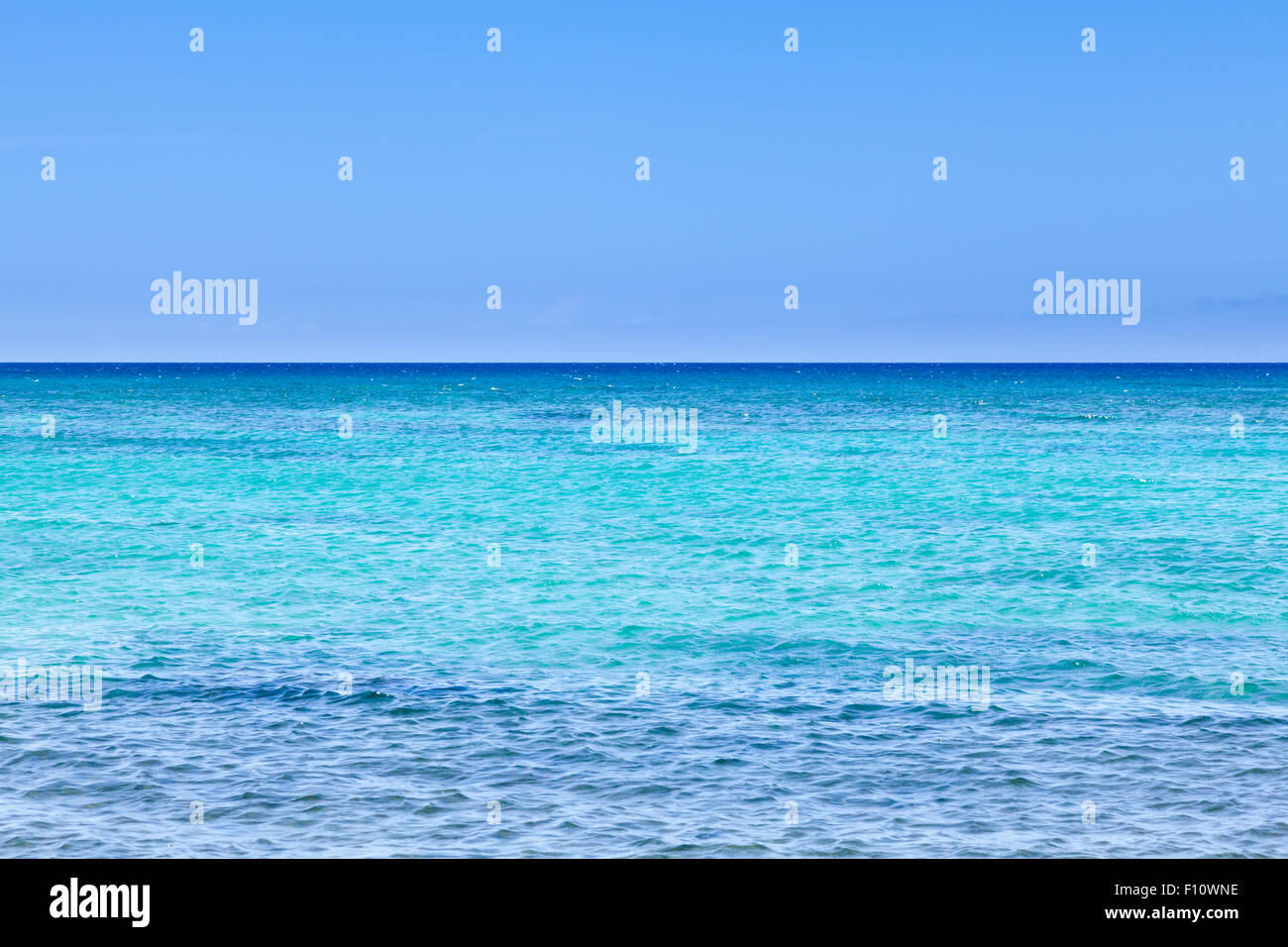 Wide angle panoramic view of the ocean and multiple shades of vibrant ...