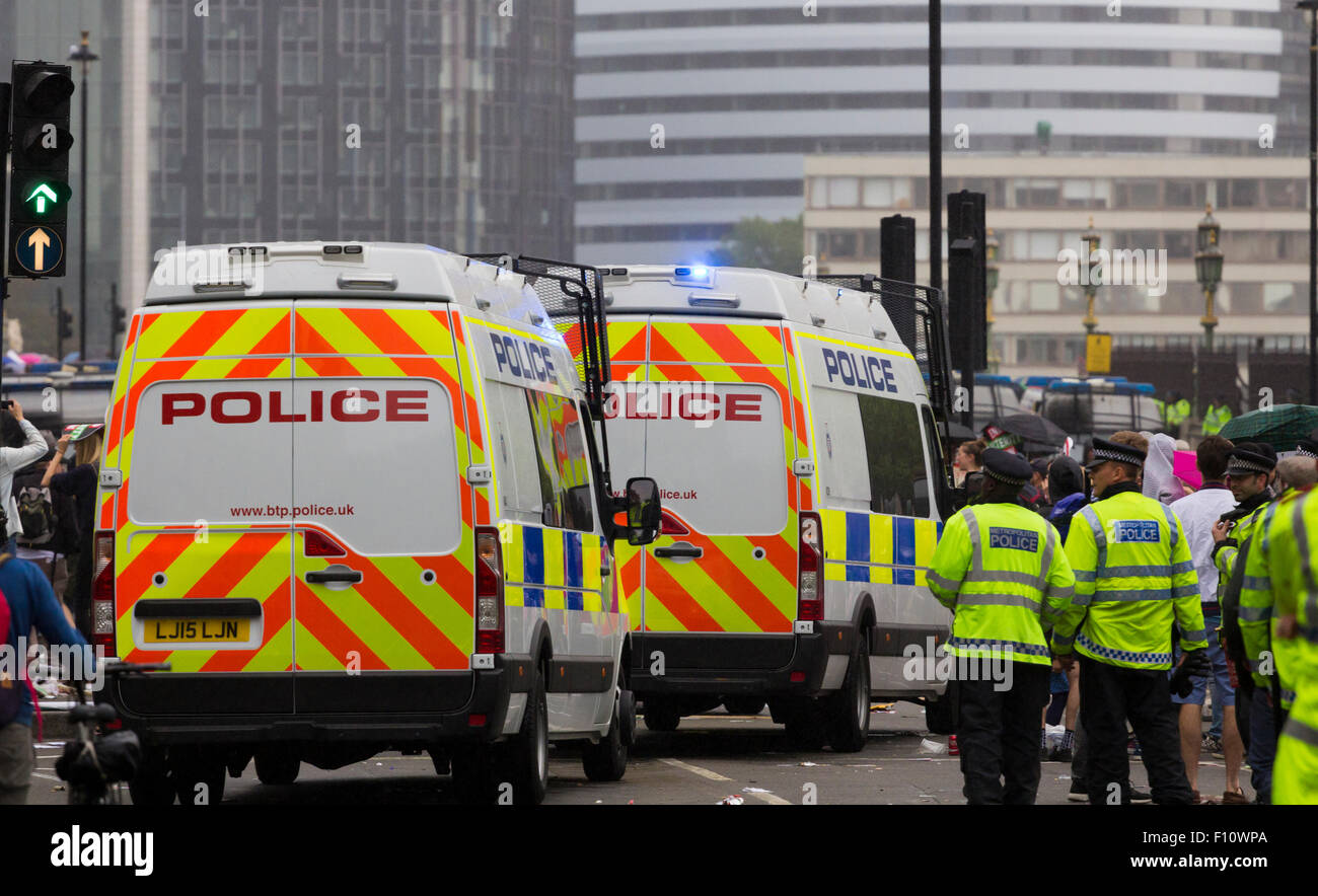 British Transport Police public order vans in convoy during a protest ...