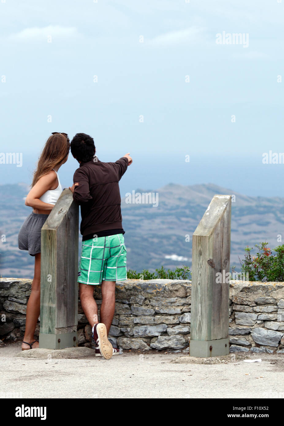 young couple admiring the view from El Toro, Mount Toro, the highest ...