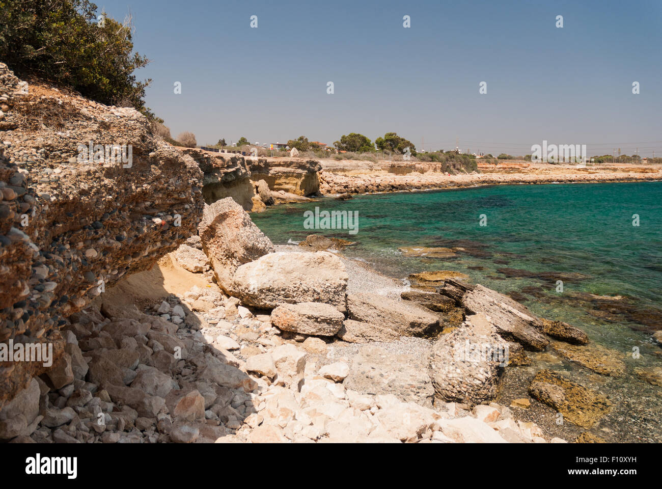 Wild beach with rocks in Dhekelia area. Cyprus Stock Photo - Alamy