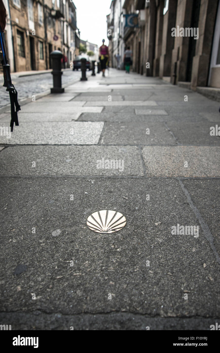 Way of St. James scallop shell symbol in pavement Stock Photo - Alamy