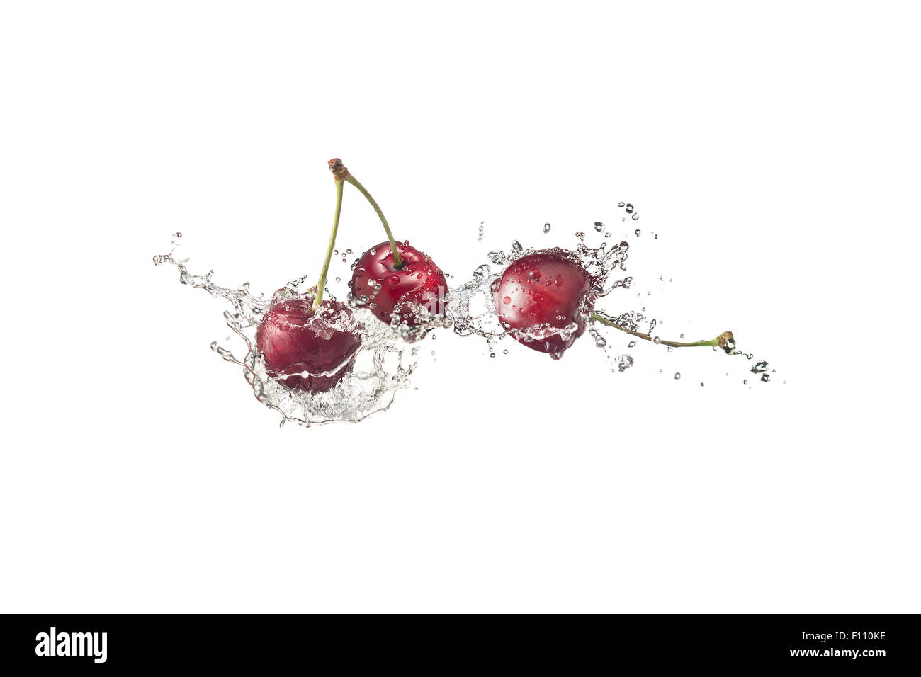 Cherries with water splashes, isolated on white background Stock Photo ...
