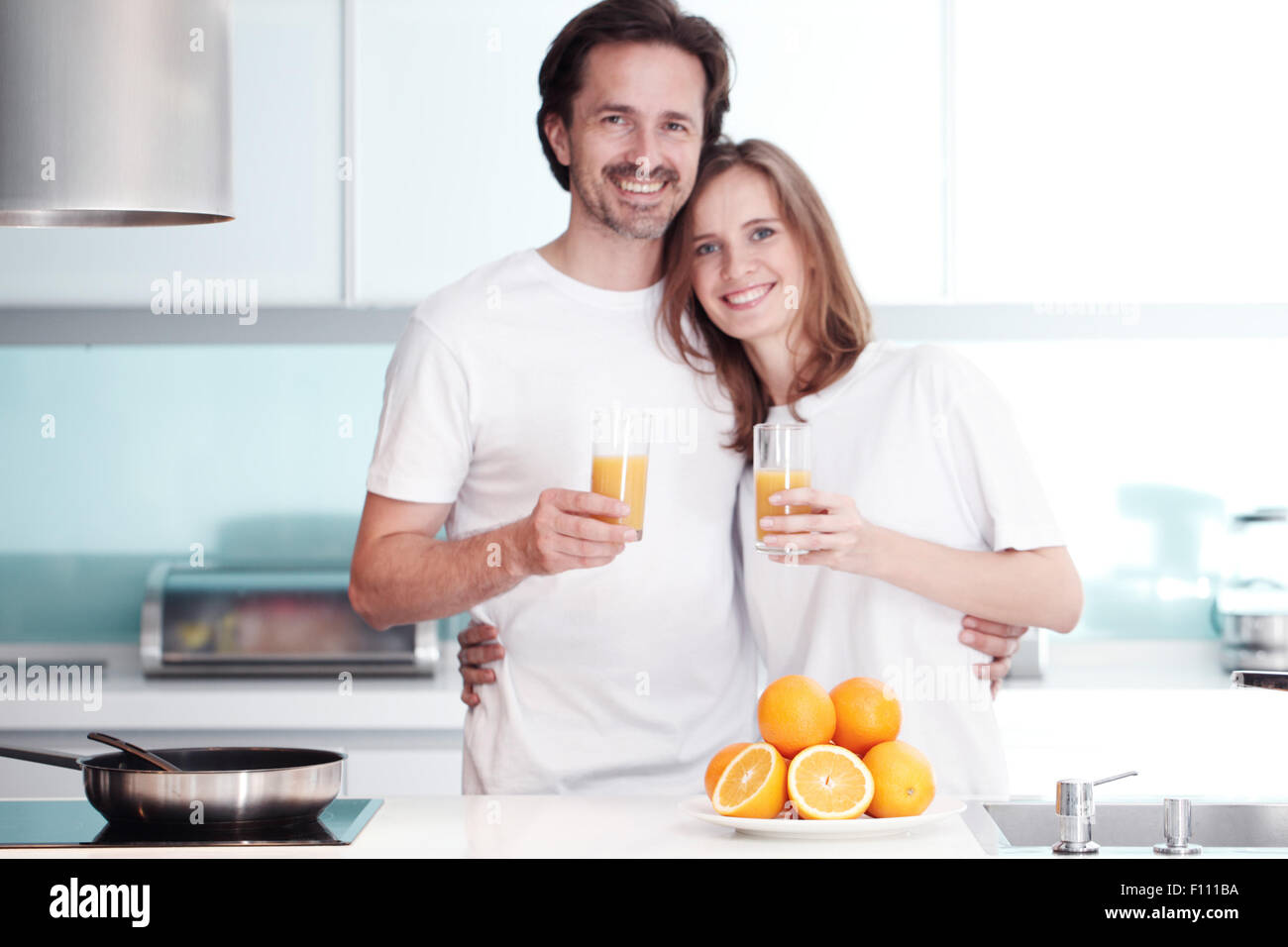 couple cooking breakfast Stock Photo - Alamy