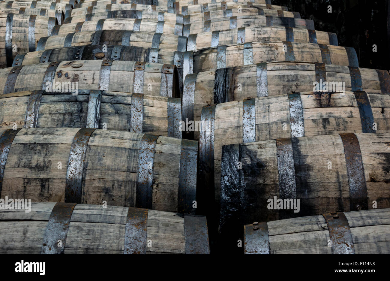 Bourbon barrels on their side in a distillery Stock Photo - Alamy