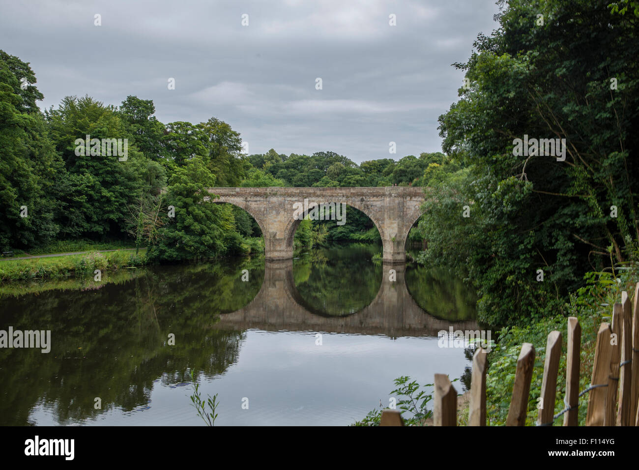 The old stone medieval bridge Prebends Bridge with reflections in the ...