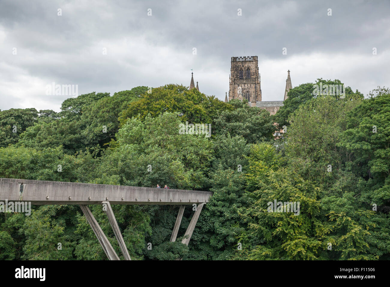 The concrete Kingsgate bridge over the River Wear leading to trees with ...