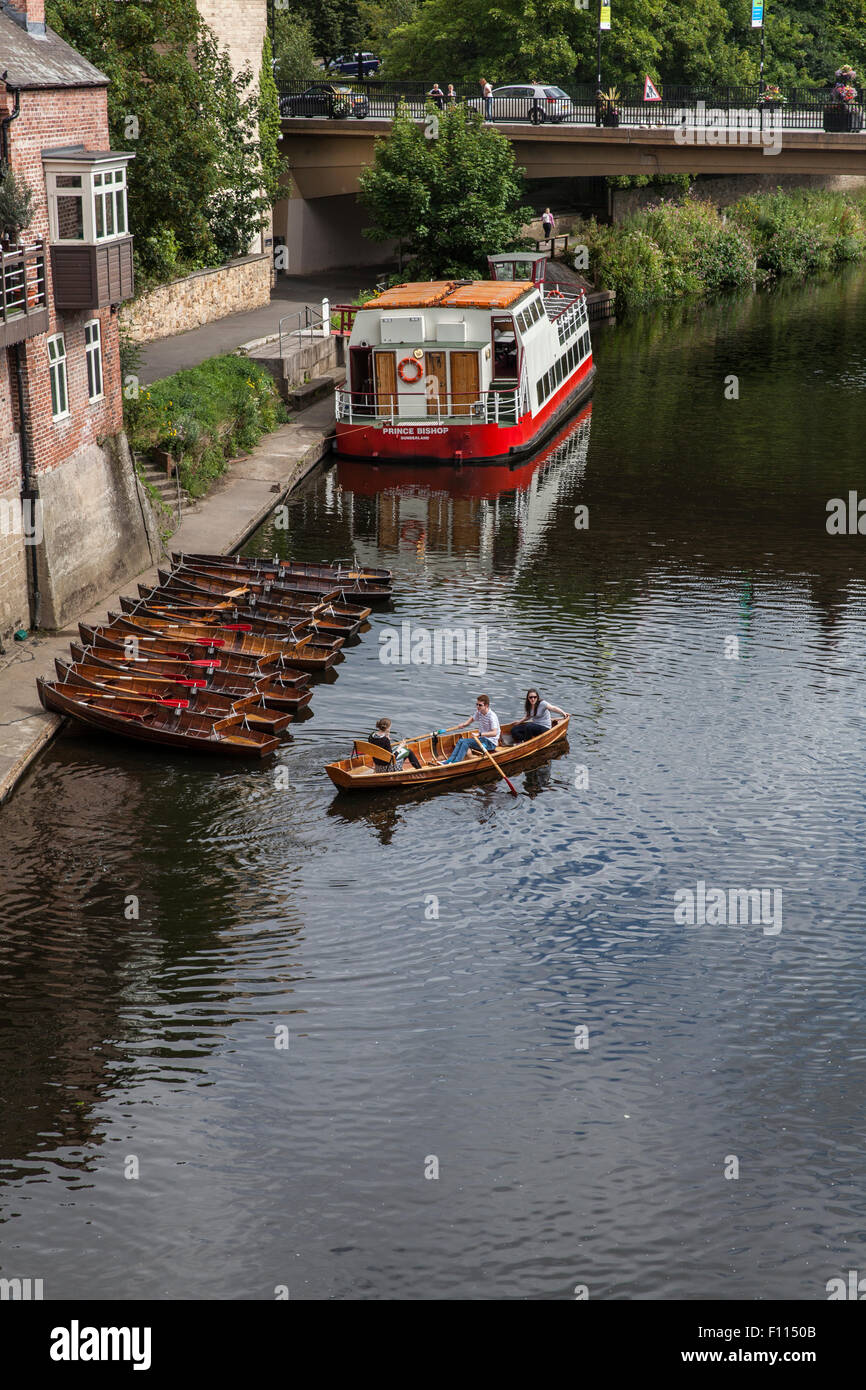 Rowers rowing a rowing boat on the River Wear near the centre of the ...