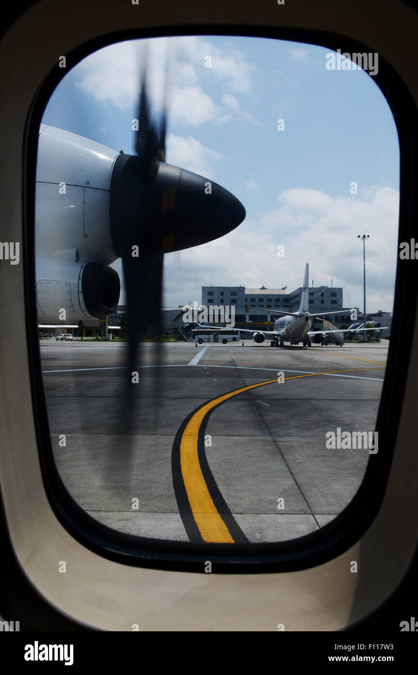 view airport from window airplane ATR 72 Stock Photo - Alamy