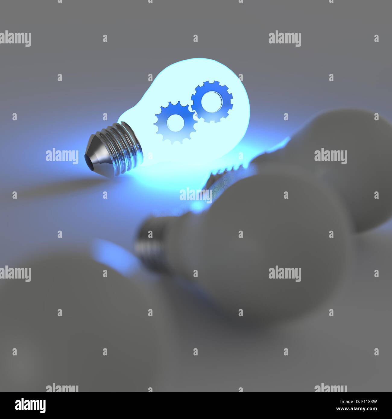light bulb with gears as concept Stock Photo - Alamy