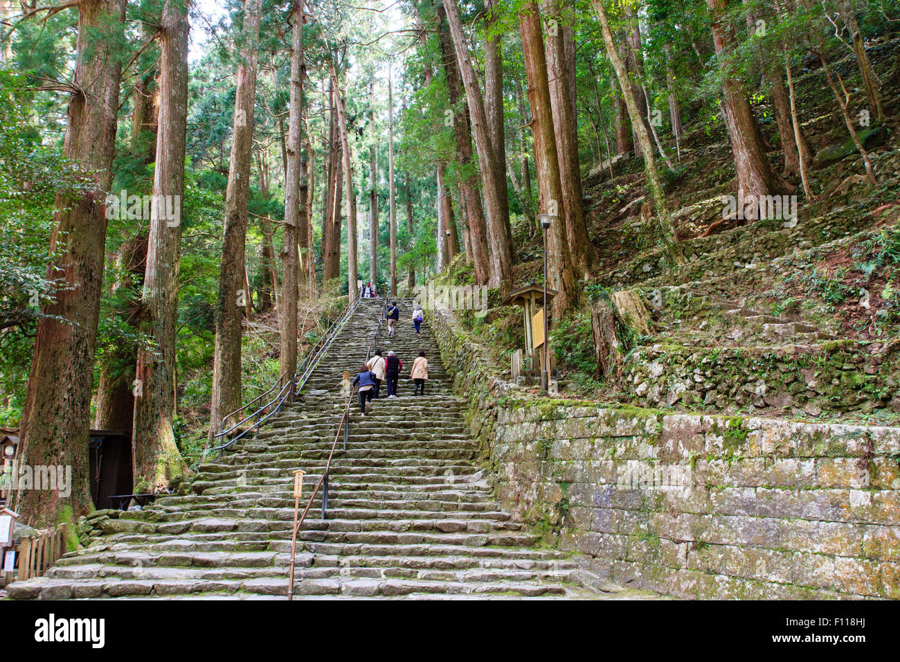 Japan, Nachikatsuura. The wide stone steps with central wooden rail ...
