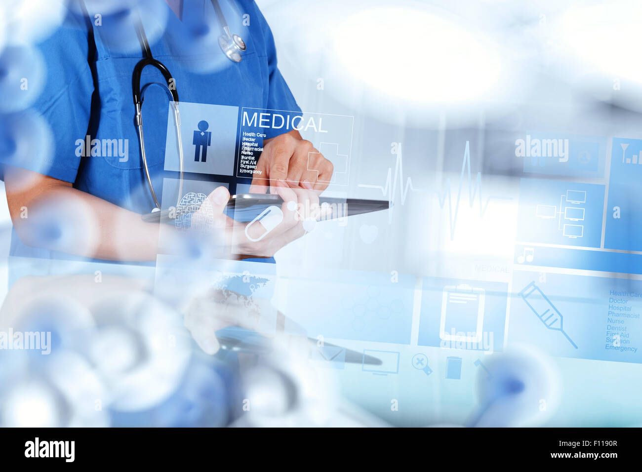 Medicine doctor hand working with modern computer interface as medical ...