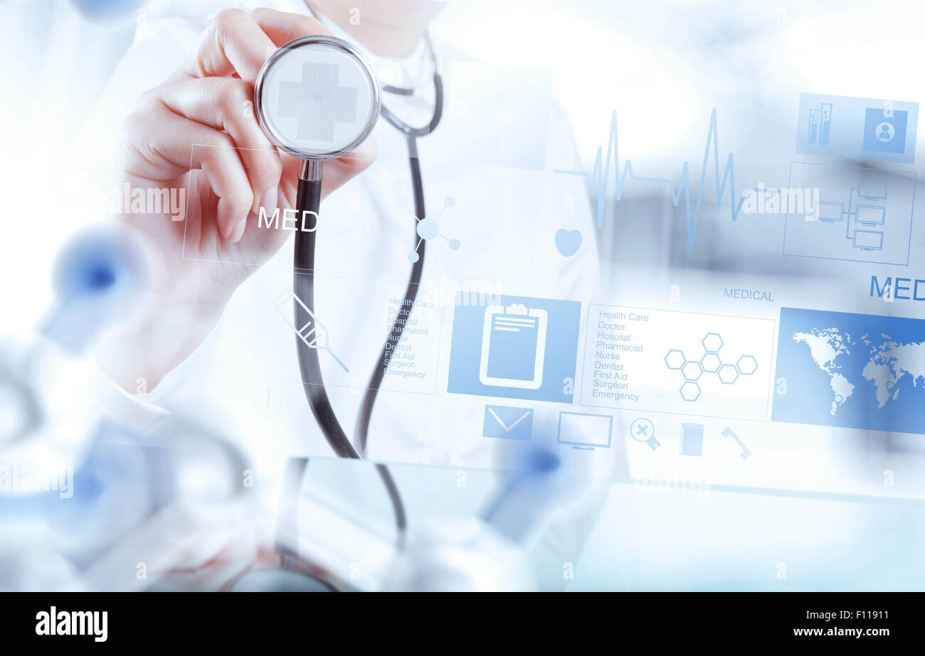 Medicine doctor hand working with modern computer interface as medical ...