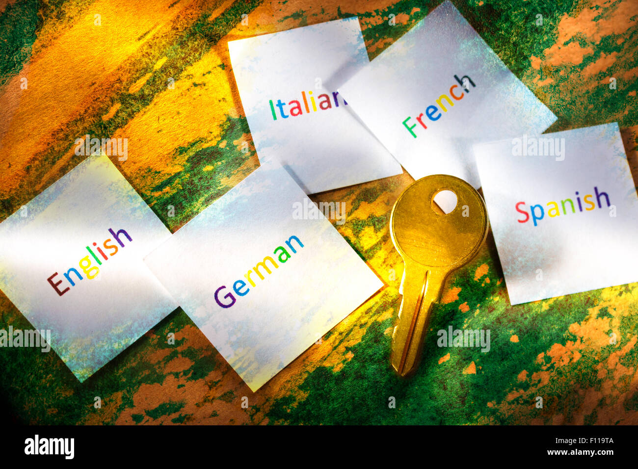 Cards with different languages and key in light Stock Photo - Alamy
