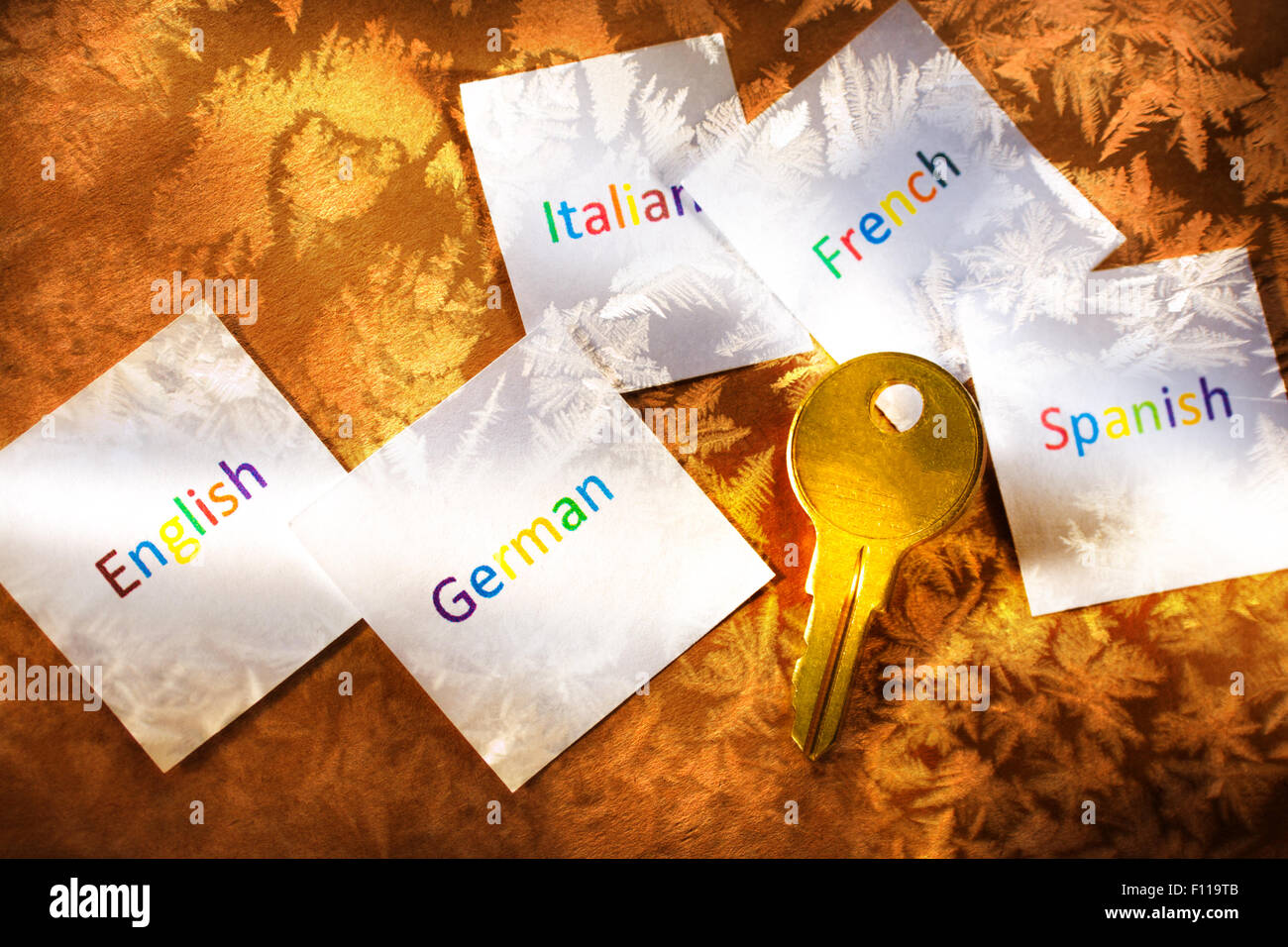 Cards with different languages and key in light Stock Photo - Alamy