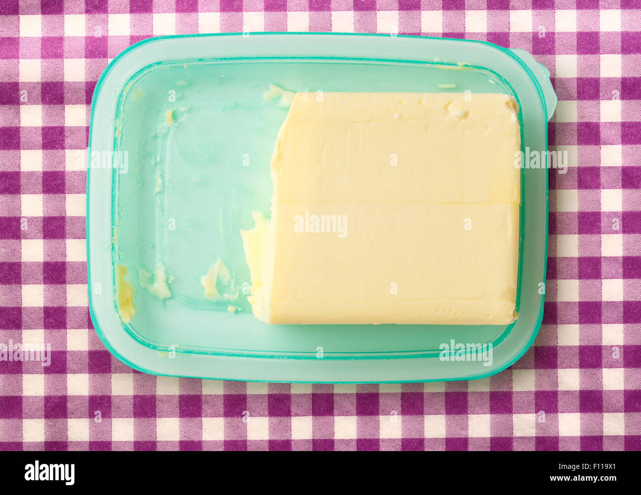 Fresh butter on the open green butterdish Stock Photo - Alamy