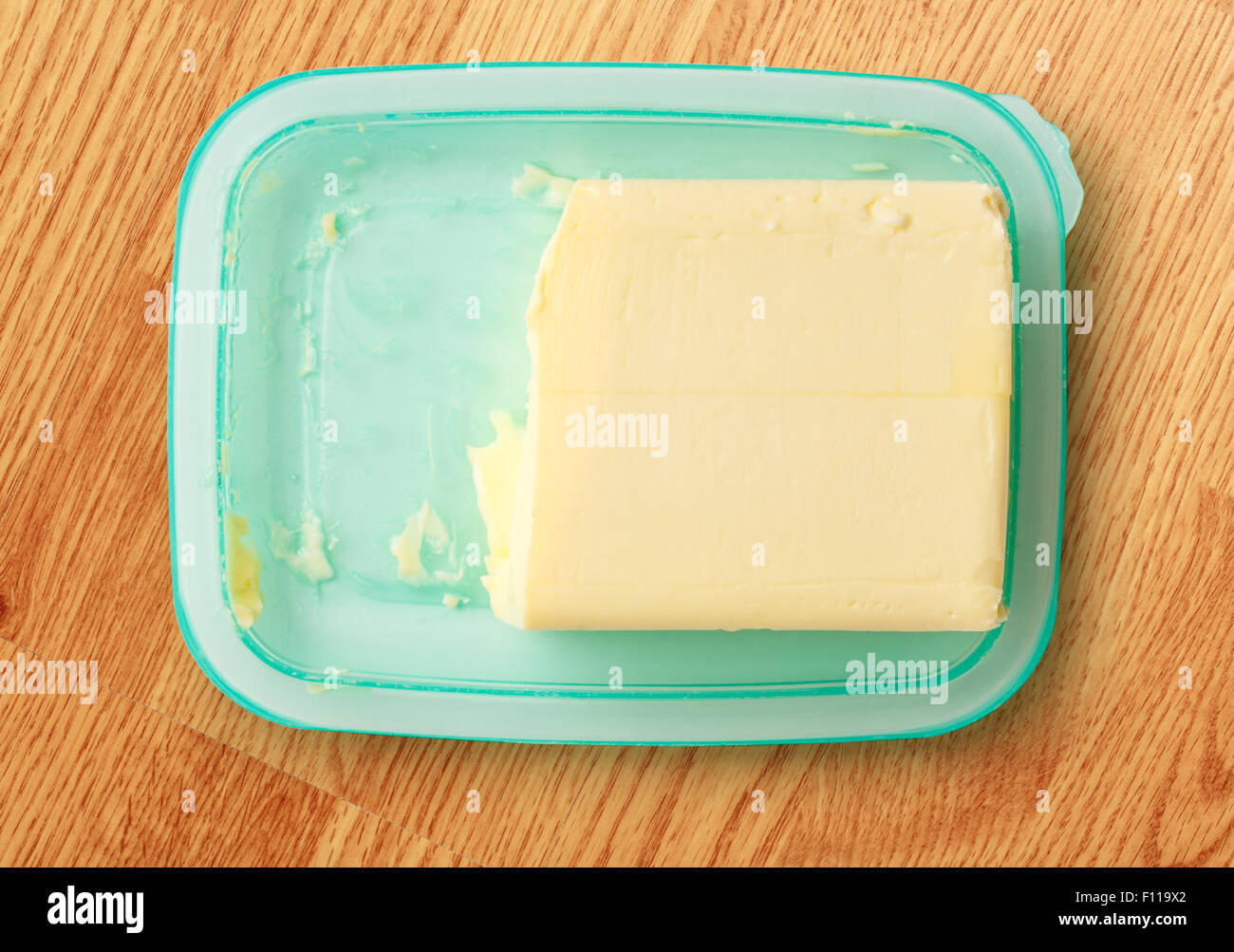 Fresh butter on the open green butterdish Stock Photo - Alamy