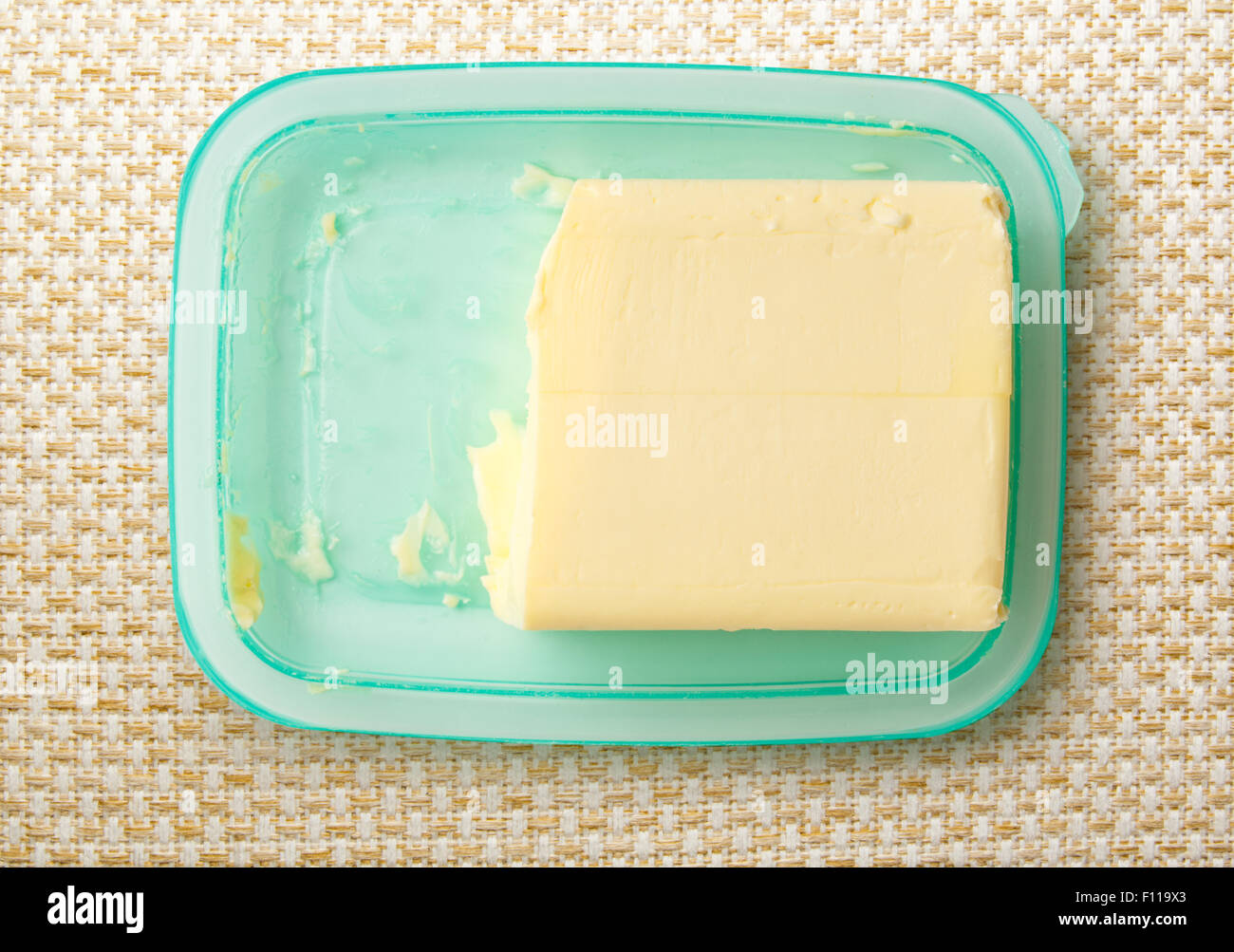 Fresh butter on the open green butterdish Stock Photo - Alamy
