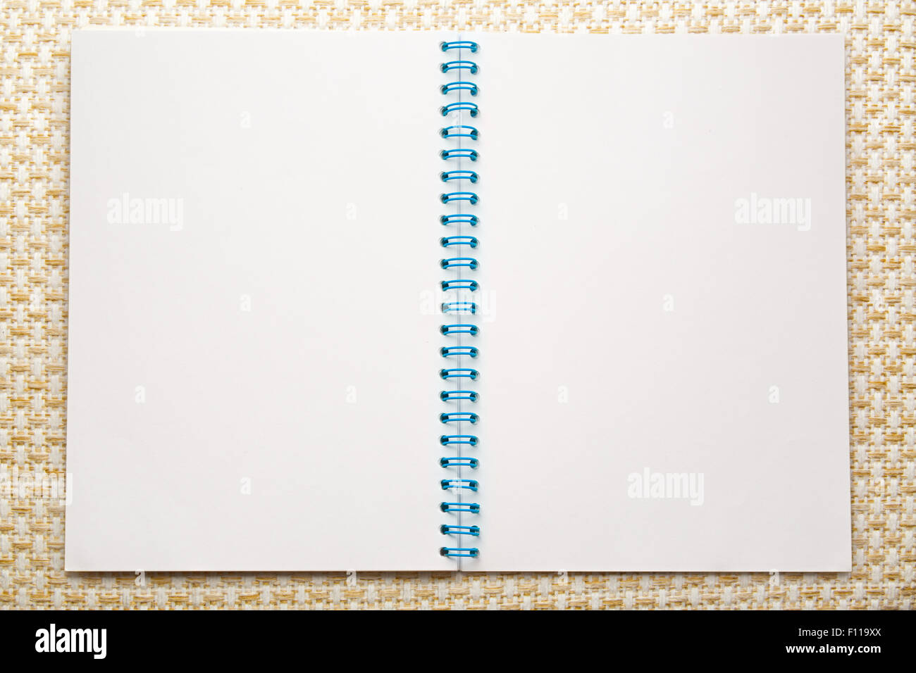 Blank open notepad on the textile background Stock Photo - Alamy