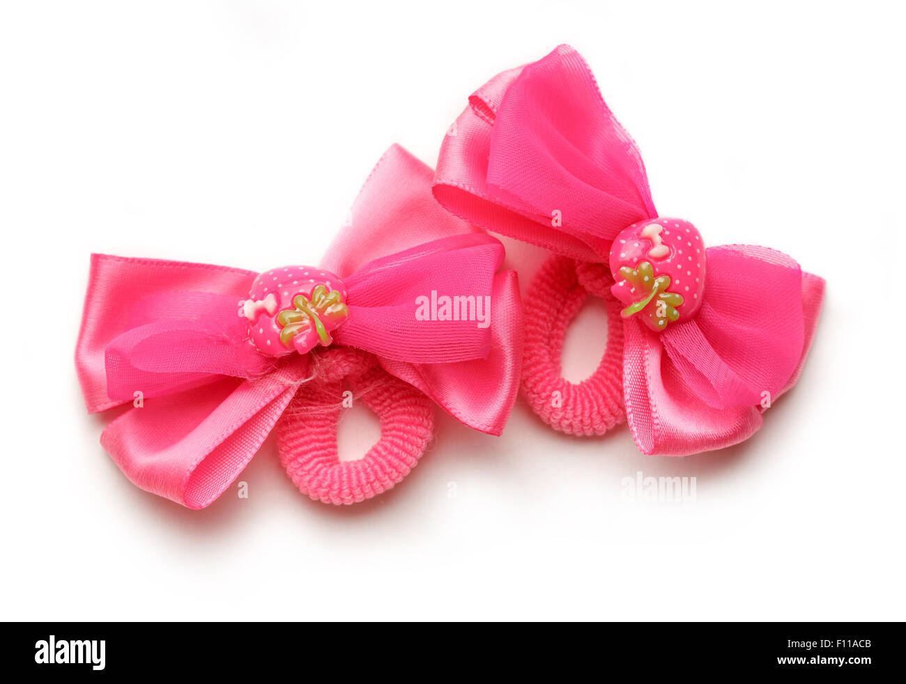 Pink rubber bands for a child on the white background Stock Photo - Alamy